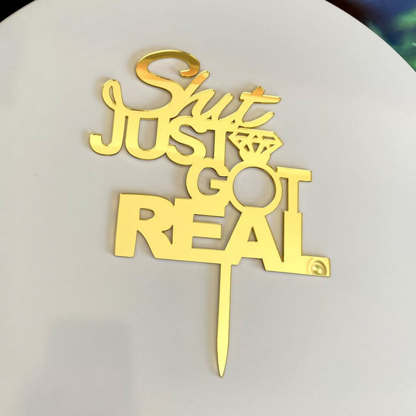 Gold Acrylic 'Shit Just Got Real' Cake Topper